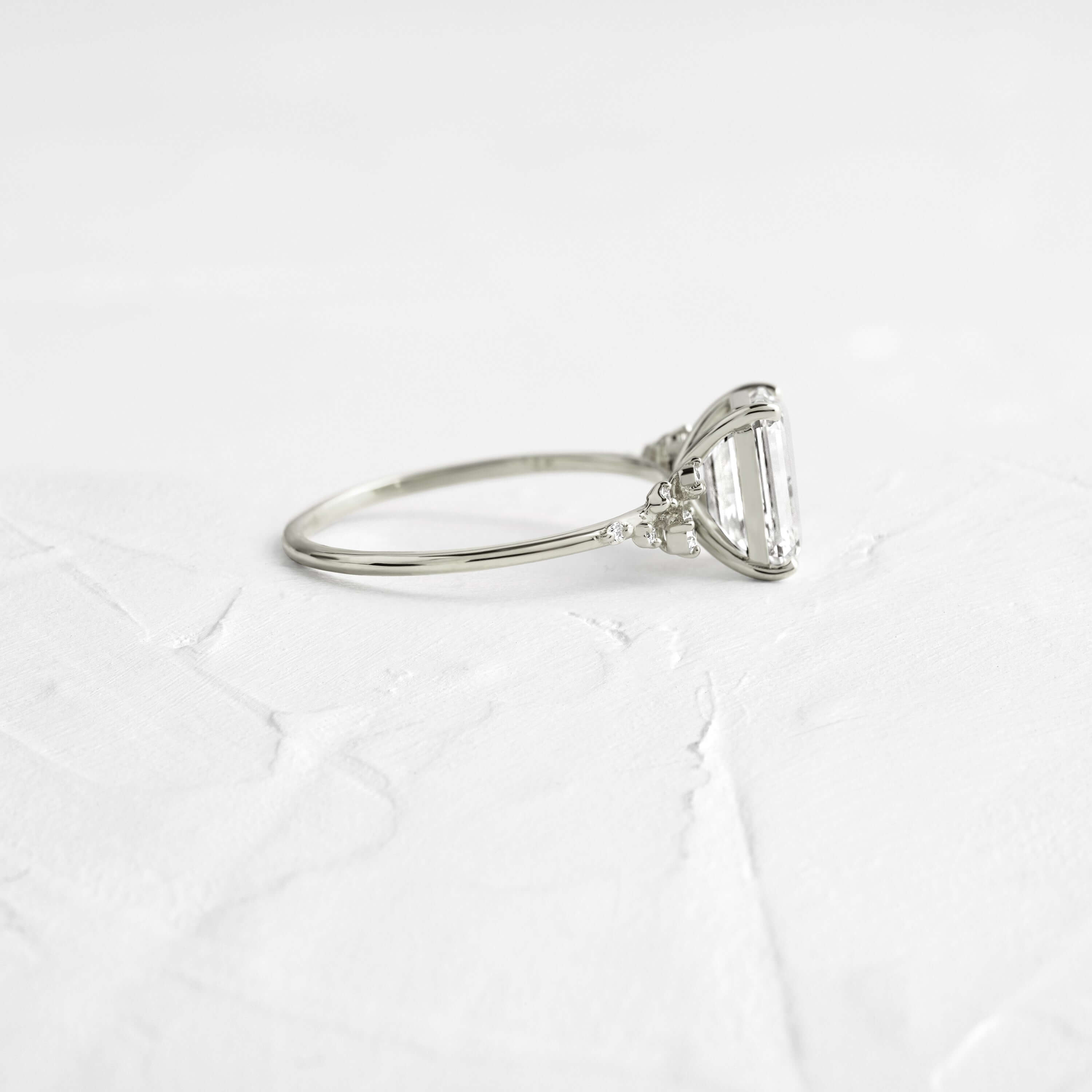 Snowdrift Ring with a Modern Emerald Cut Diamond by Melanie Casey