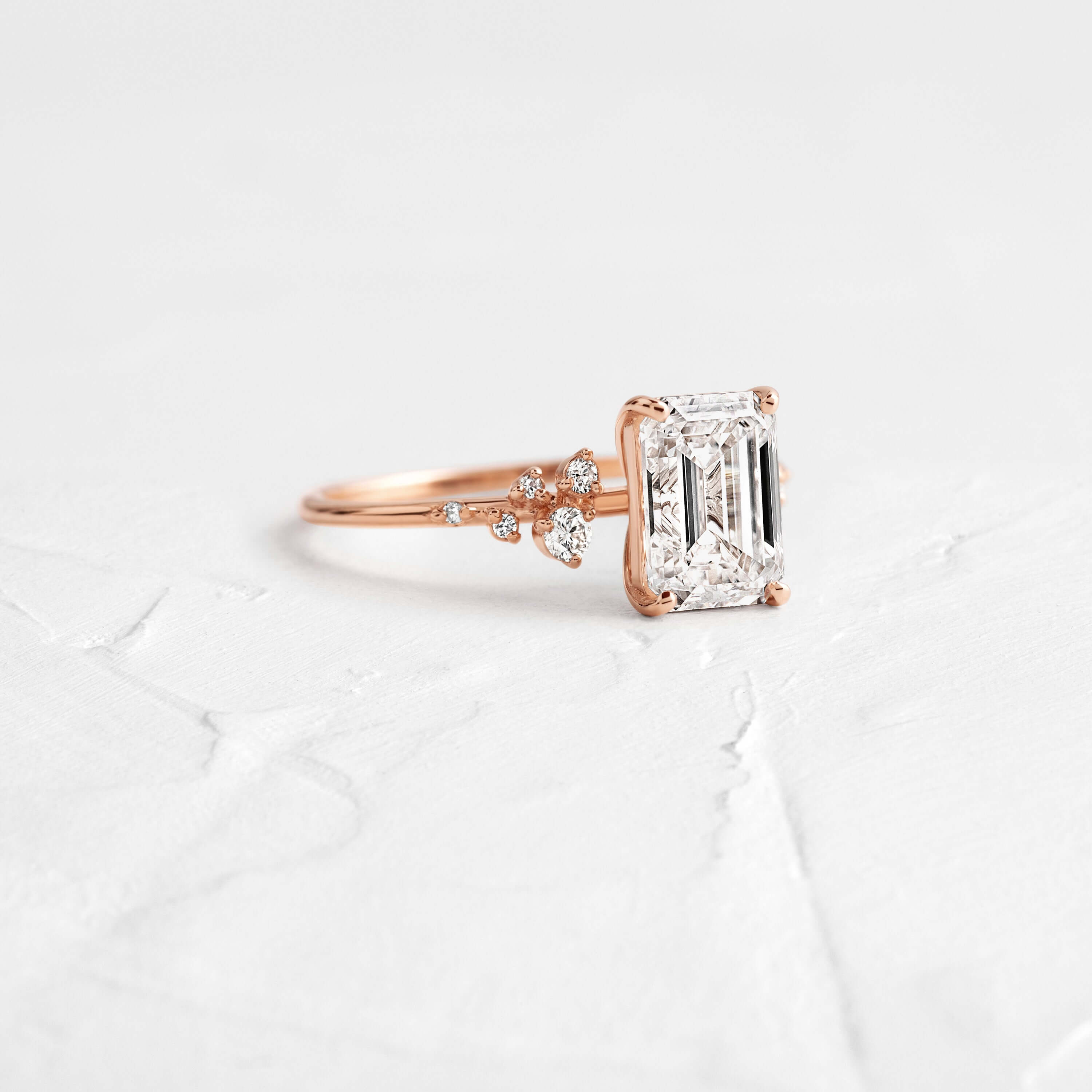 Snowdrift Ring with a Modern Emerald Cut Diamond by Melanie Casey