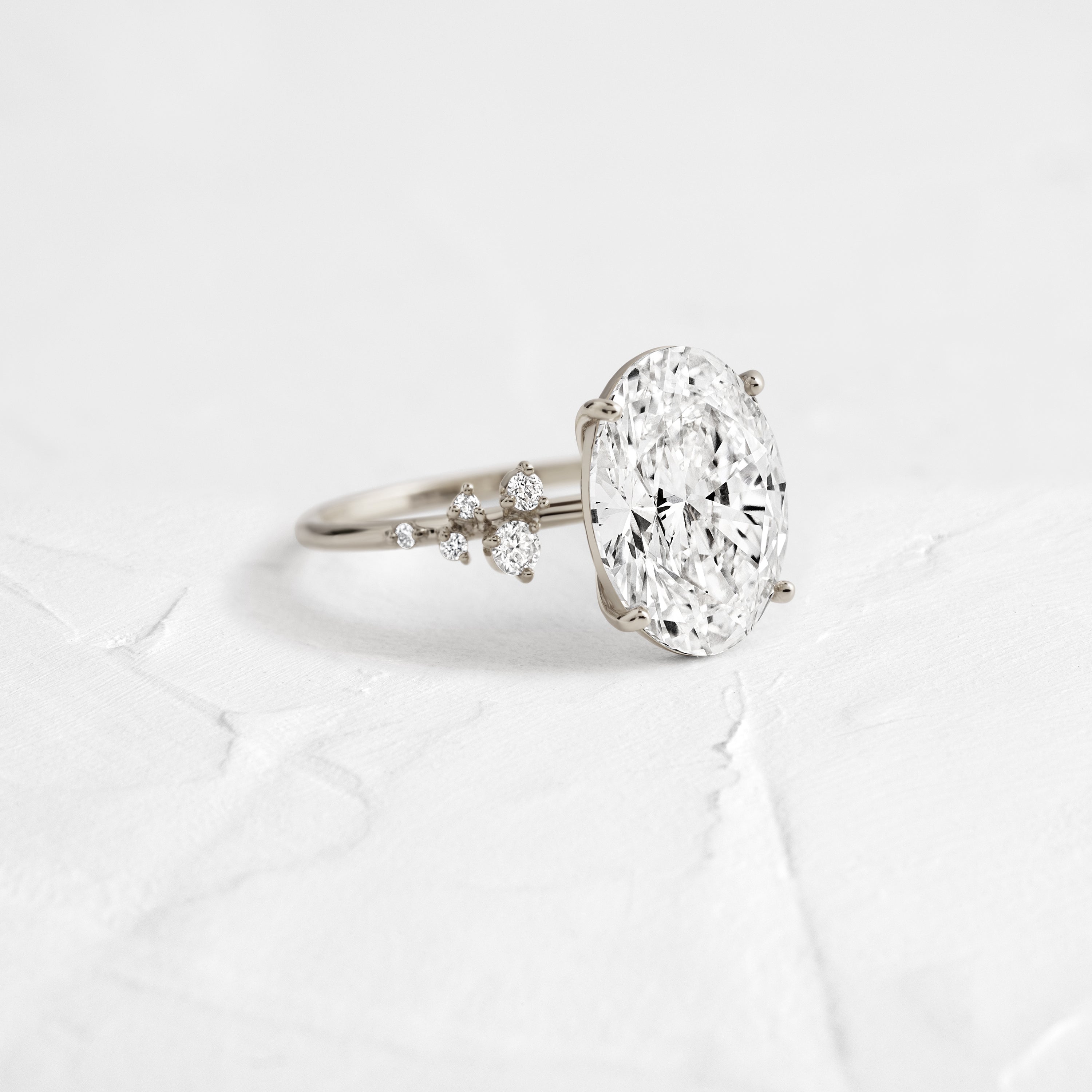 Snowdrift Ring in Oval Cut Diamond | Diamond Cluster Engagement Ring ...