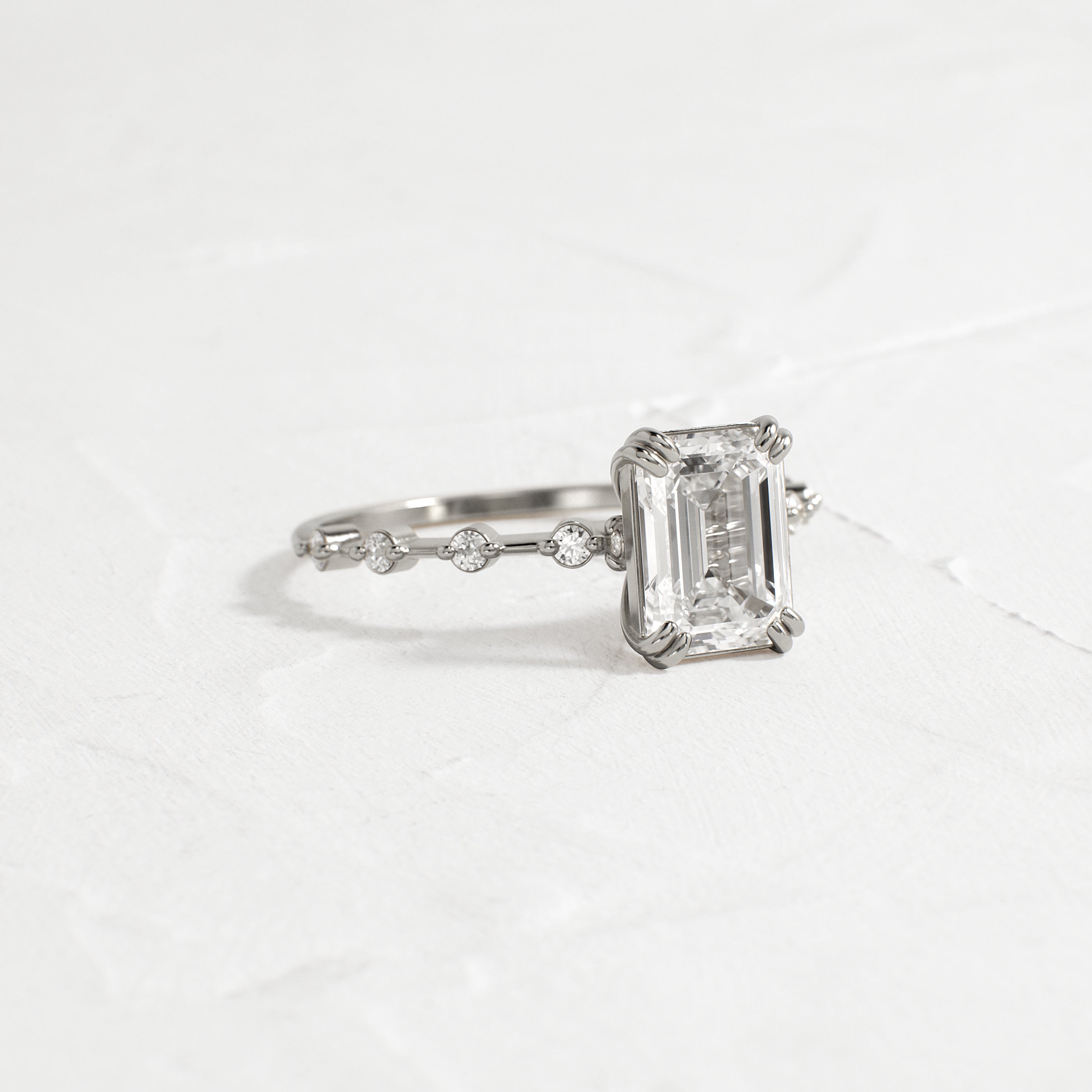 Distance Ring, Emerald Cut – Melanie Casey