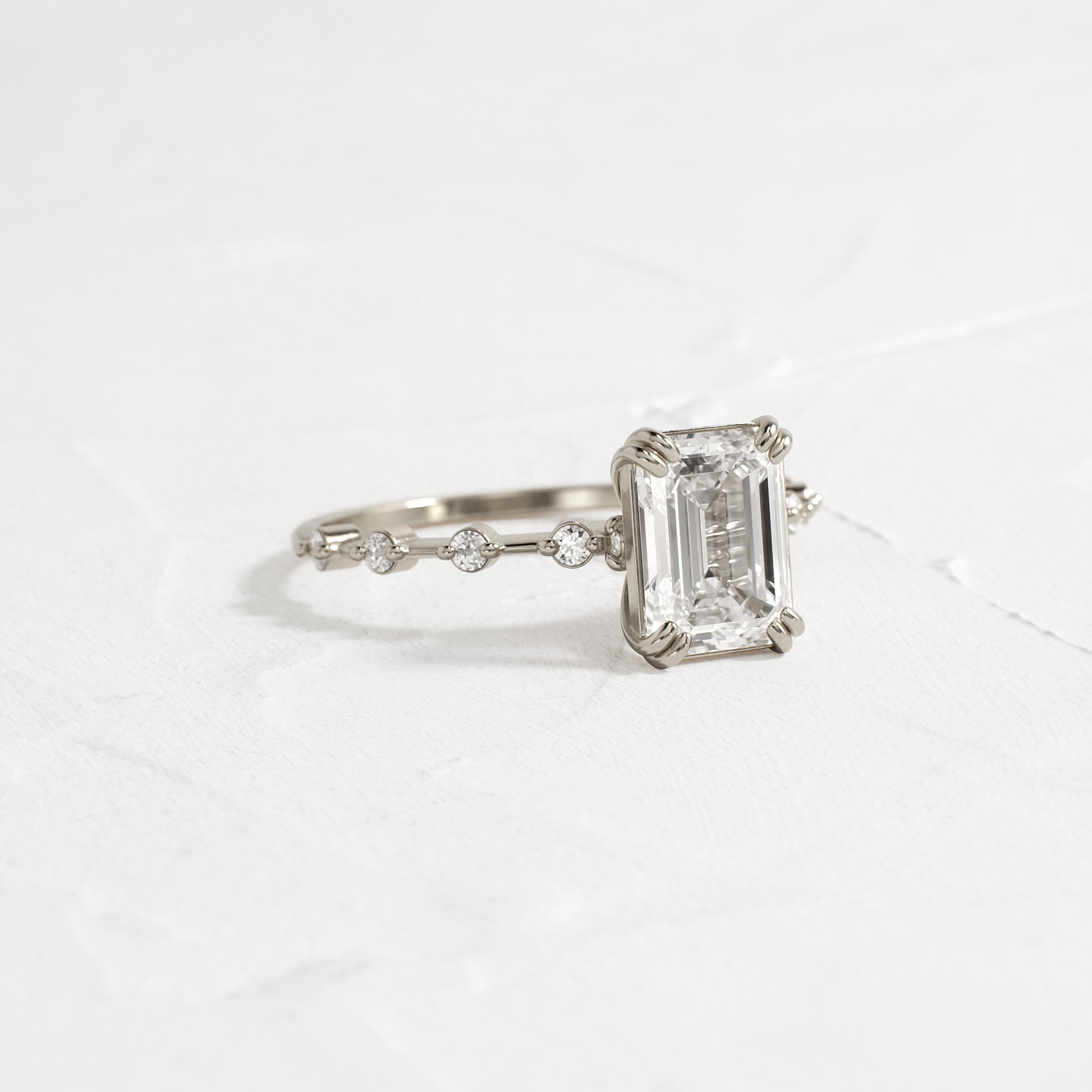 Distance Ring, Emerald Cut – Melanie Casey