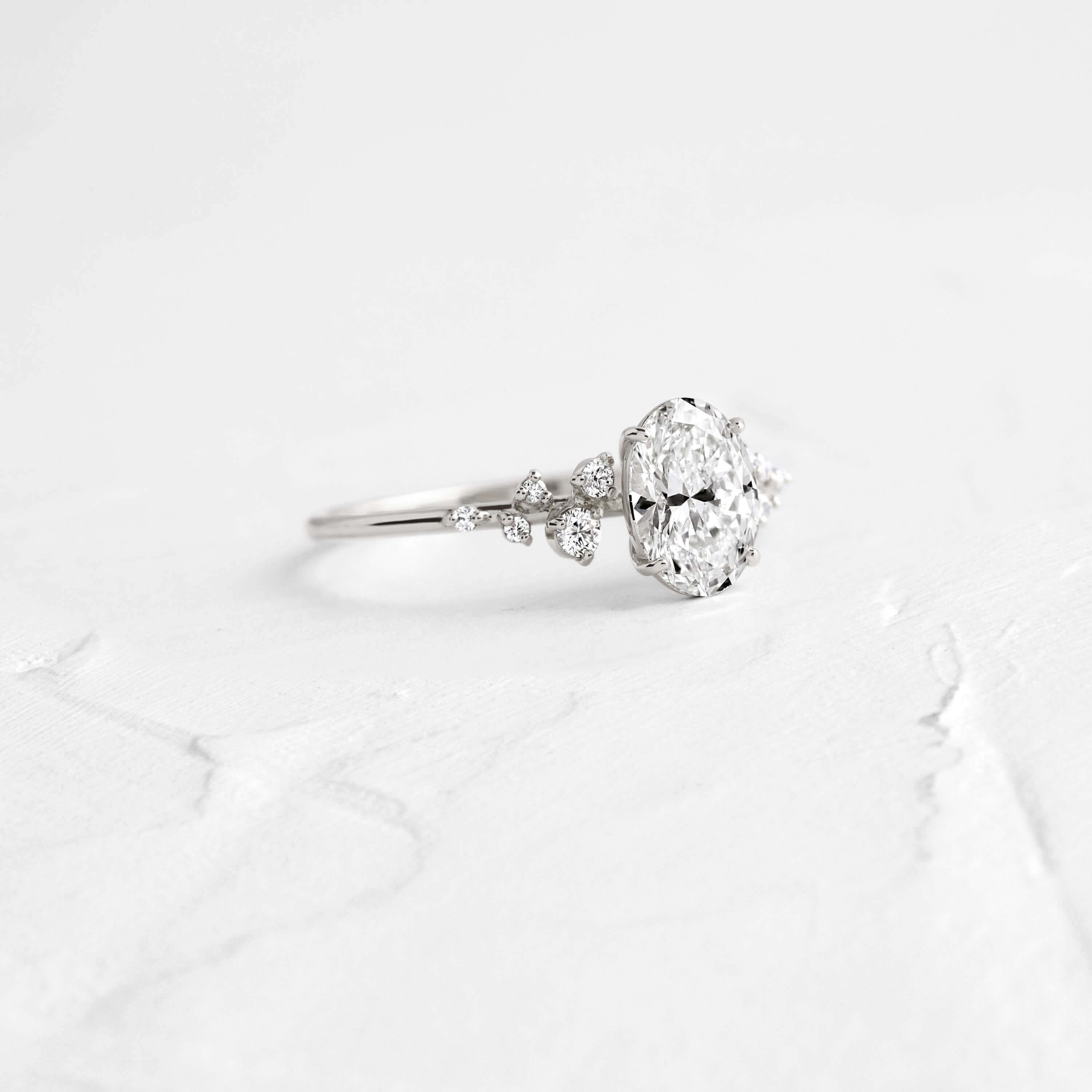 Snowdrift Ring in Oval Cut Diamond | Diamond Cluster Engagement Ring ...