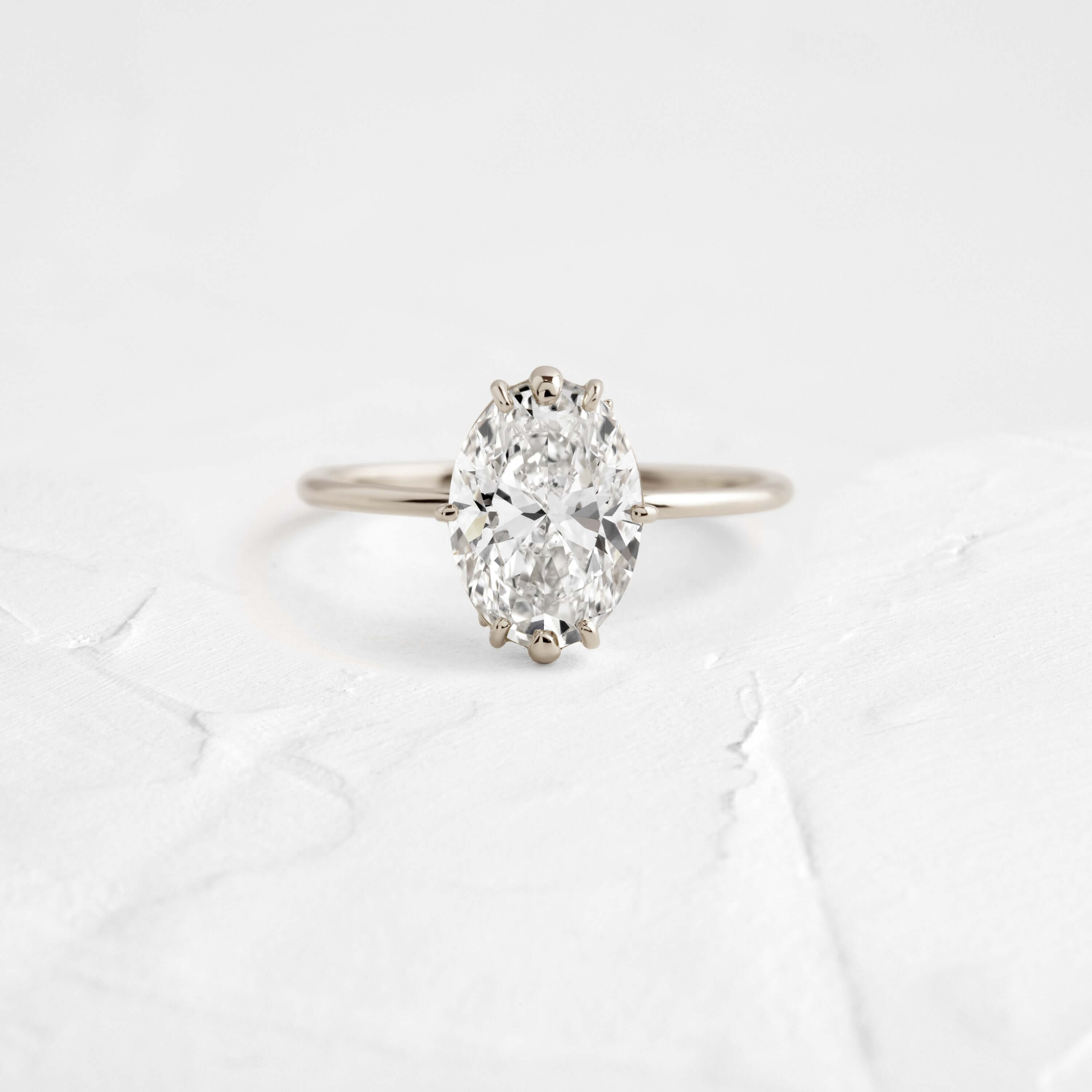Unveiled Ring with Diamond Sweep, Oval Cut - Melanie Casey