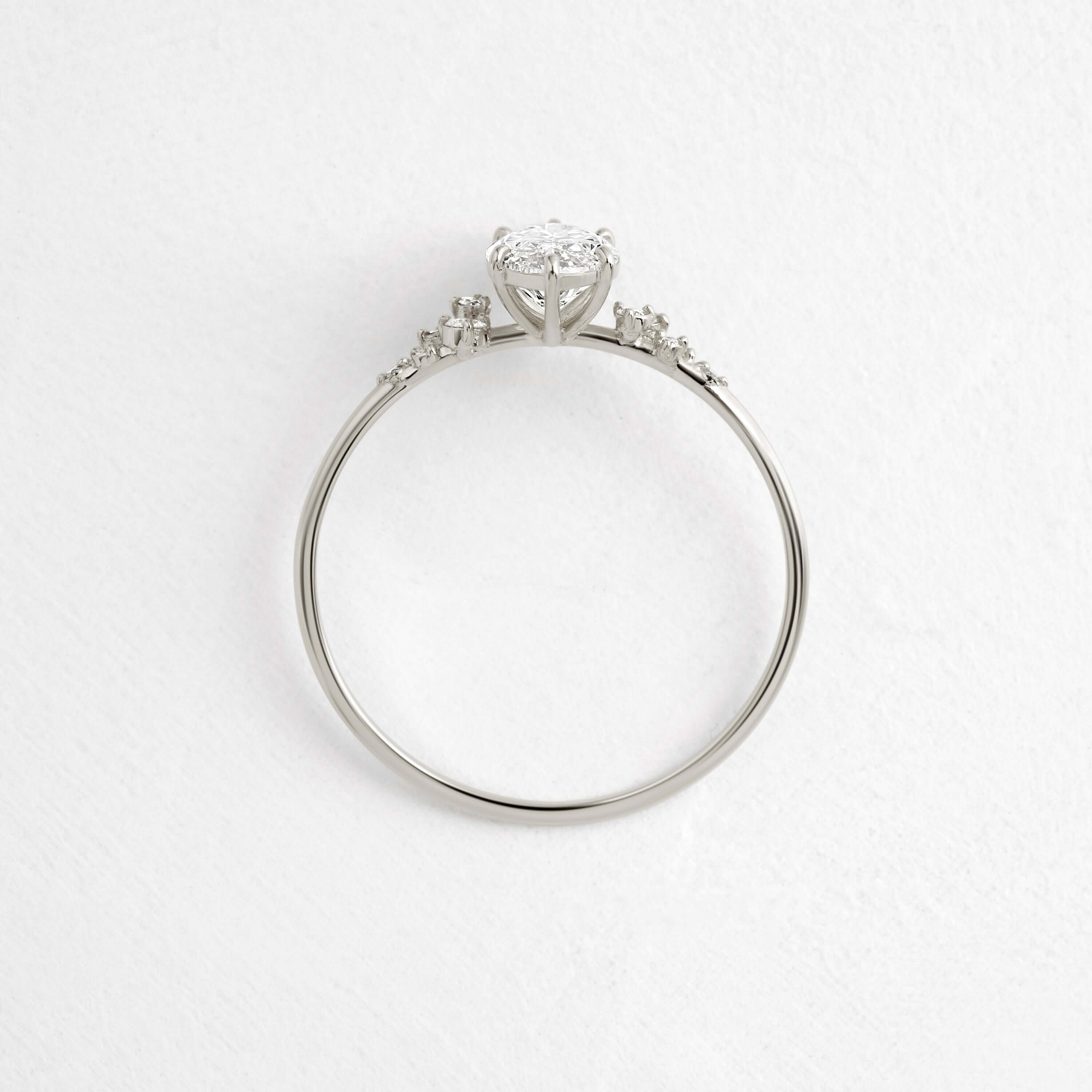 Snowdrift Ring with a Marquise Cut Diamond and Cluster Band – Melanie Casey