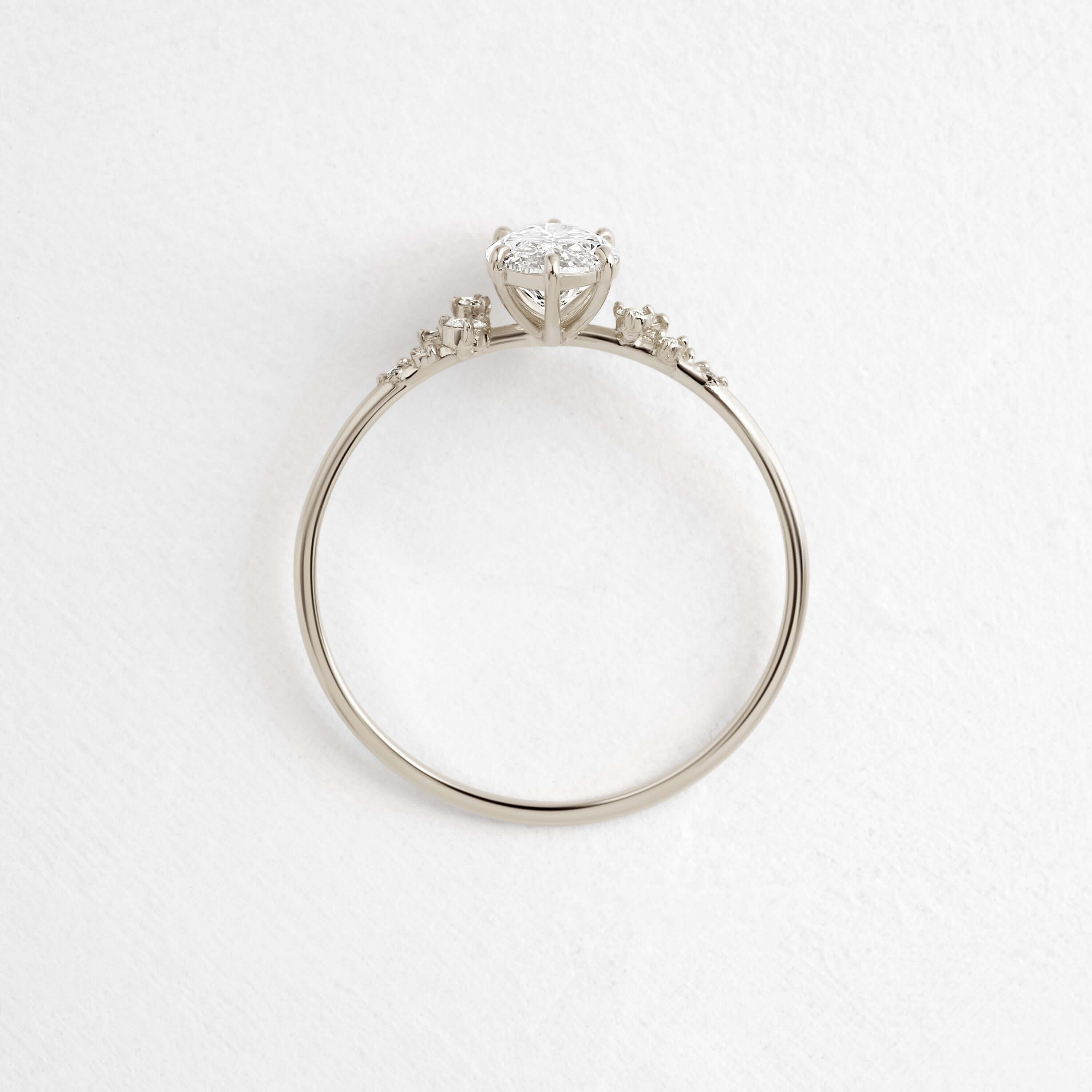 Snowdrift Ring with a Marquise Cut Diamond and Cluster Band – Melanie Casey